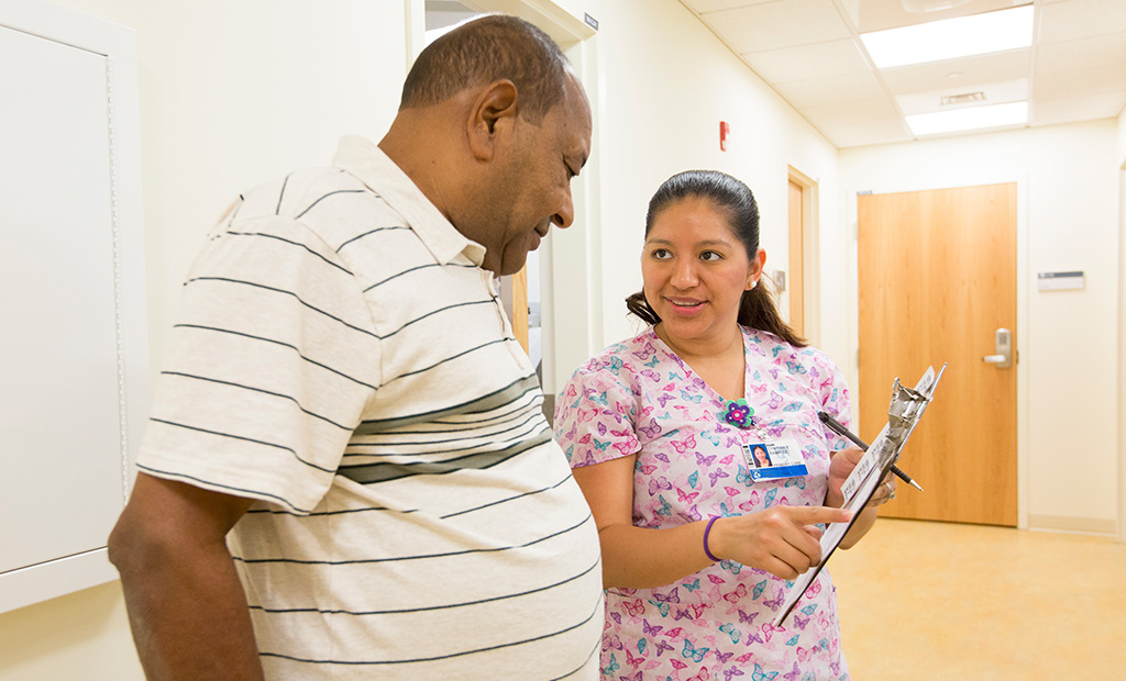 Early Experience of a Safety-Net Provider Reorganizing into an ...